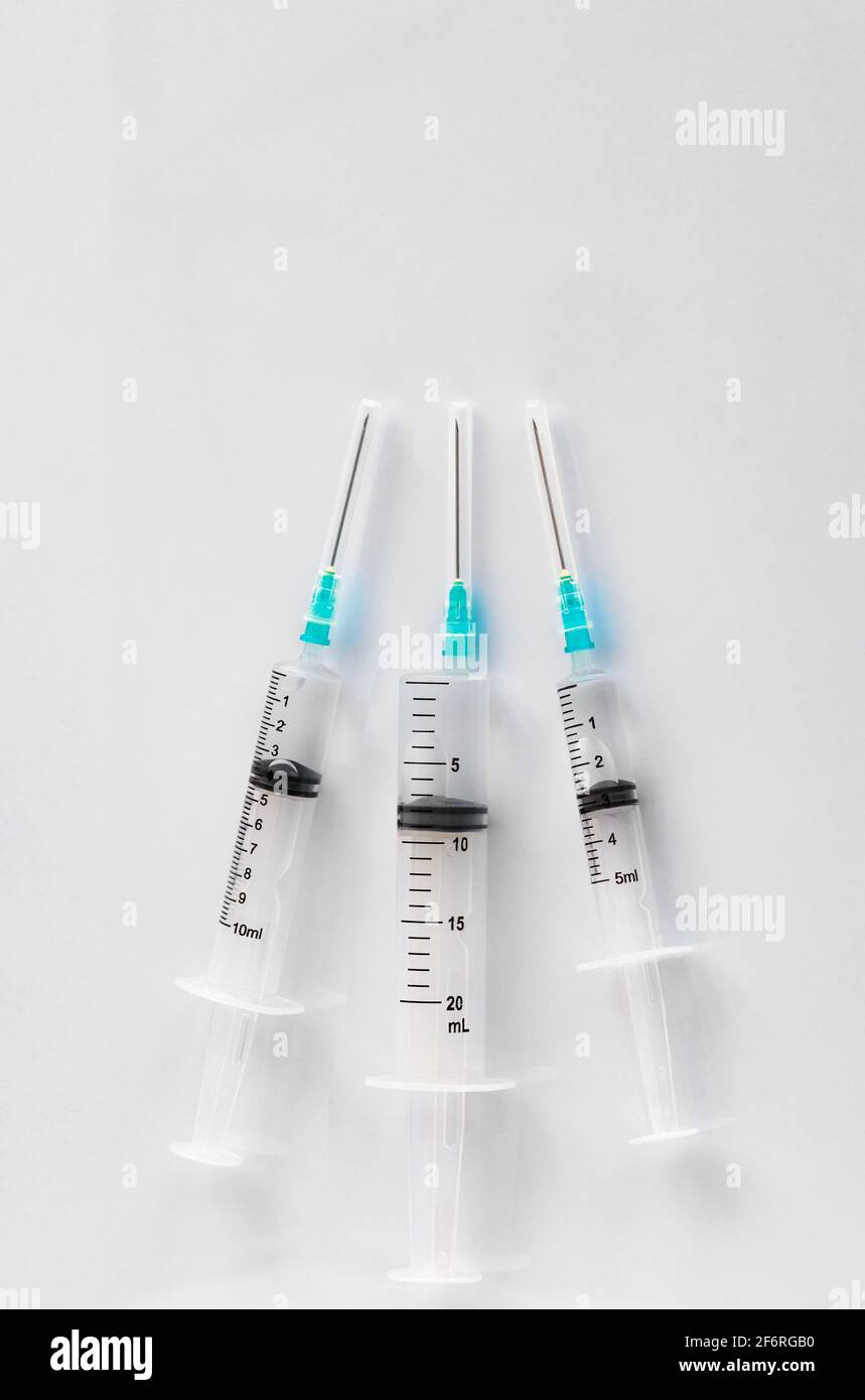Syringes three syringes hi-res stock photography and images - Alamy