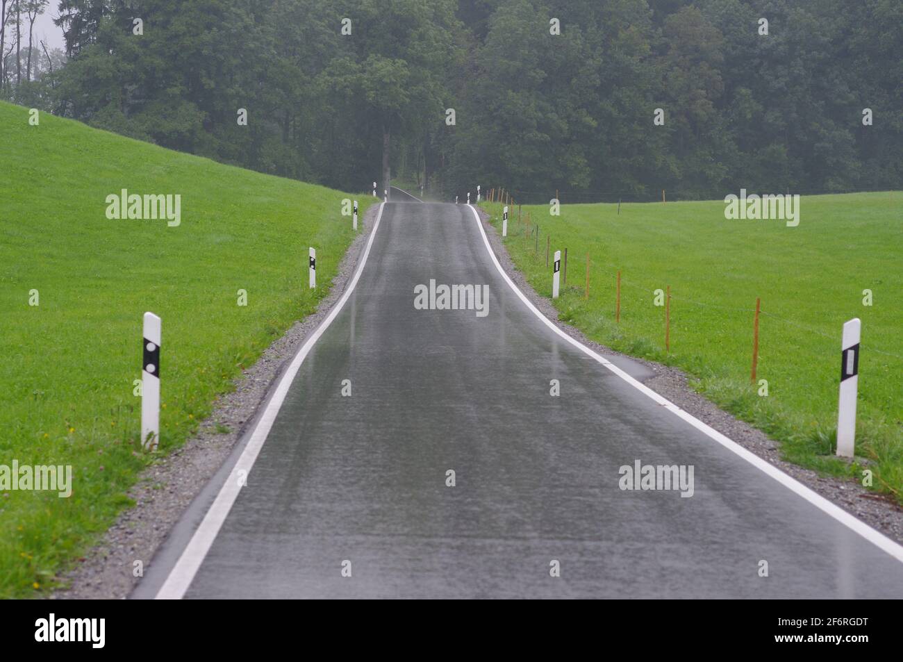 wet road landscape Stock Photo - Alamy