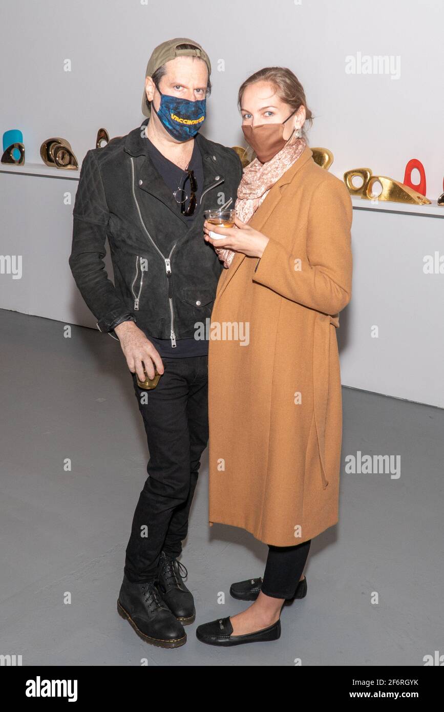 Angus Smythe and guest attend the Mia Fonssagrives Solow Sculpture ...