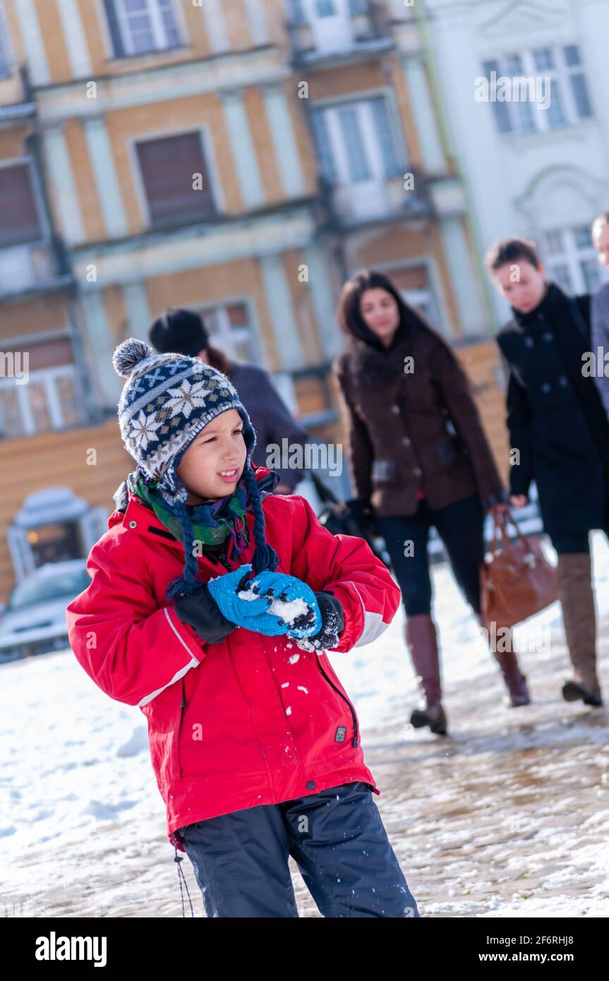 Timisoara, Romania - January 30, 2014: Kids playing with snow in the ...