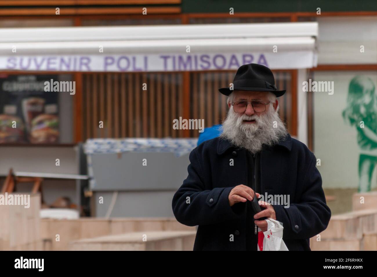 Timisoara, Romania - March 07, 2017: Man walking on the street. Real ...