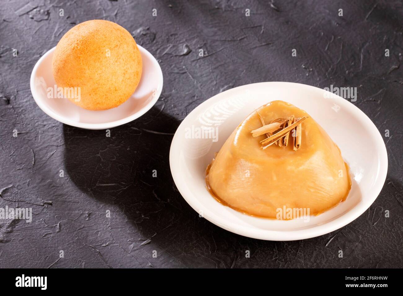 Traditional Colombian bunuelos (Deep Fried Cheese Bread) and natilla ...