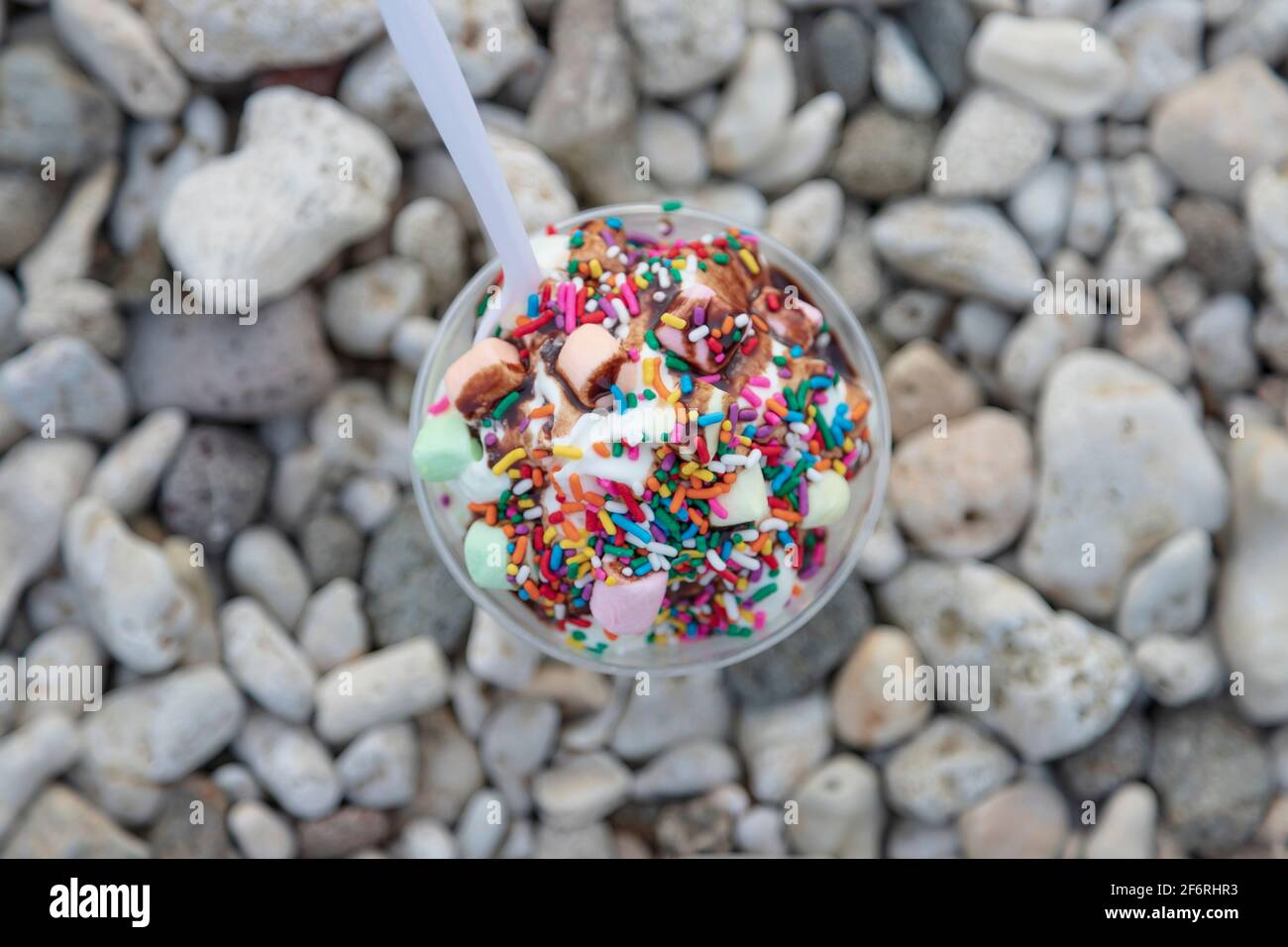 A cup of marshmellows sprinkles and ice-cream Stock Photo - Alamy