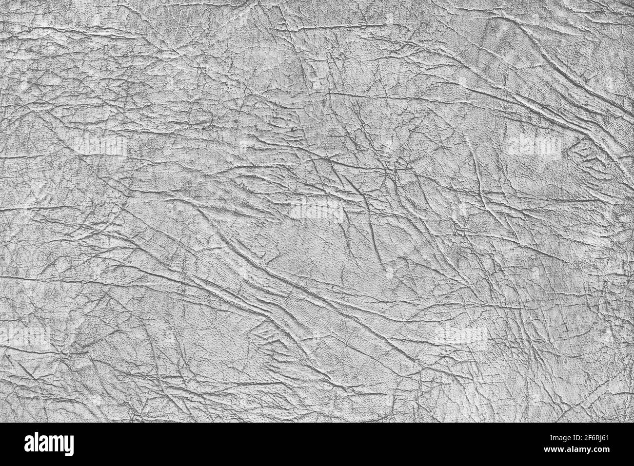 Old grey leather sofa upholstery with abstract cracks pattern texture ...