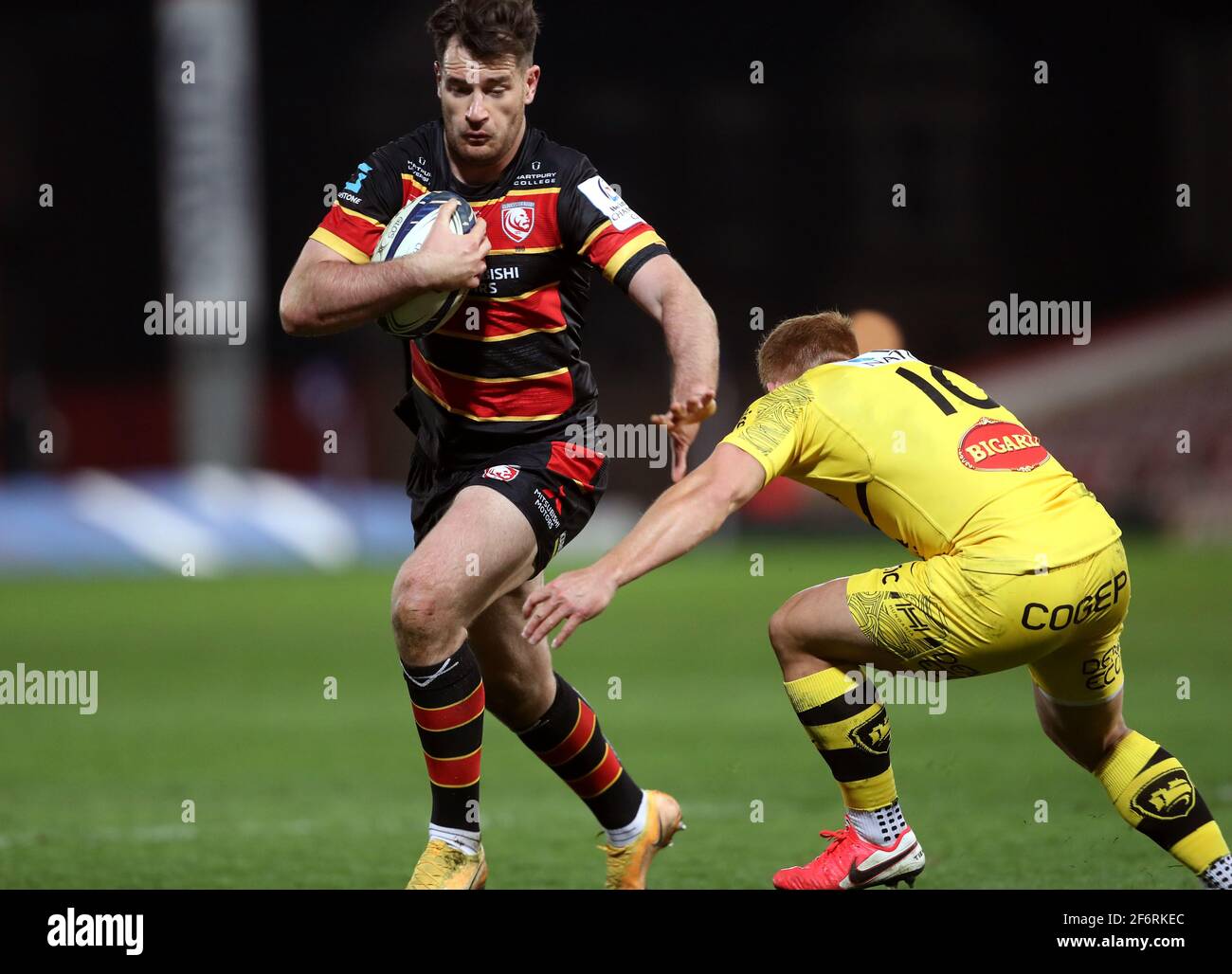 Gloucester Rugby's Mark Atkinson and La Rochelle's Ihaia West during ...