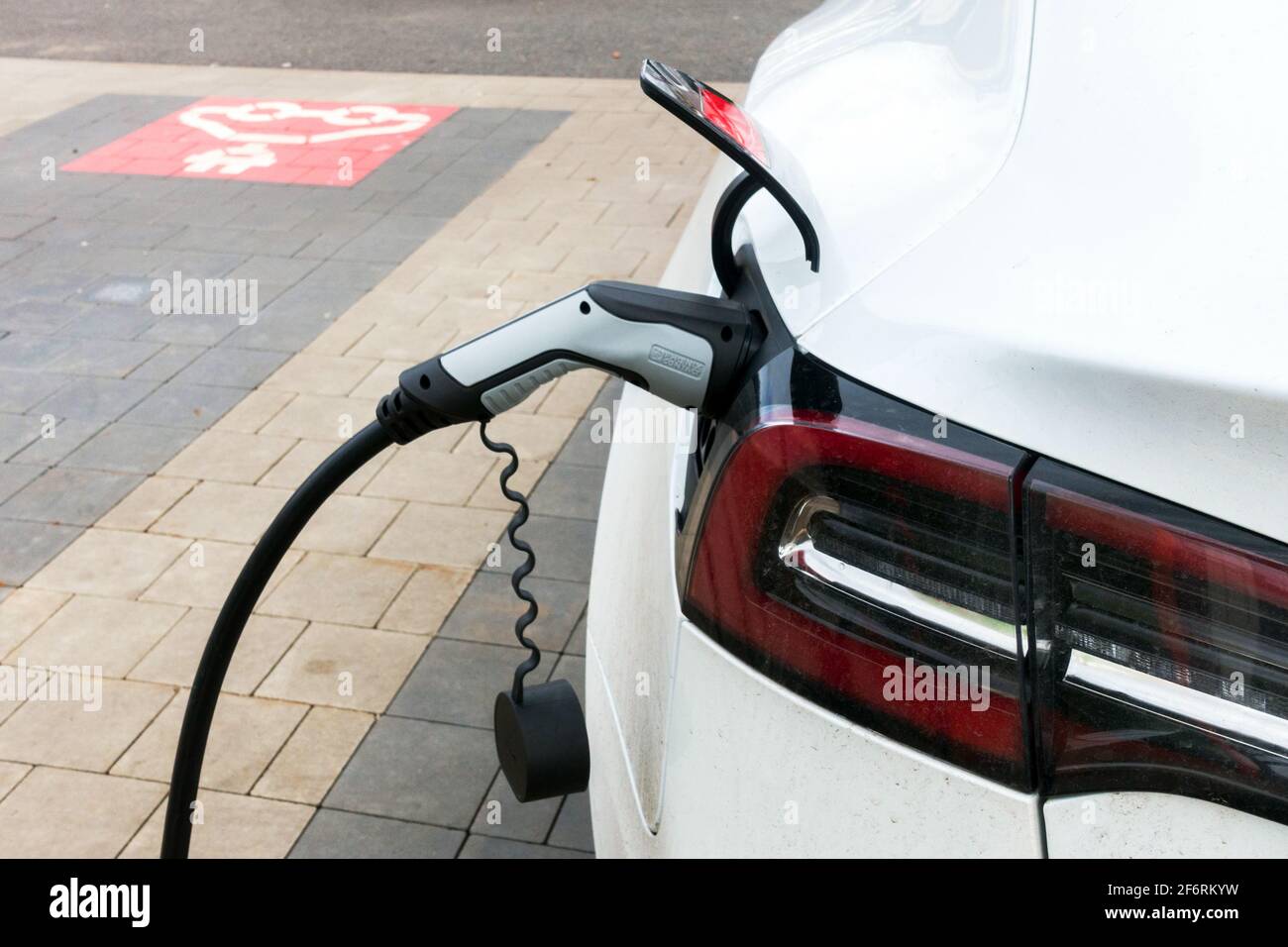 Tesla car charging Stock Photo - Alamy