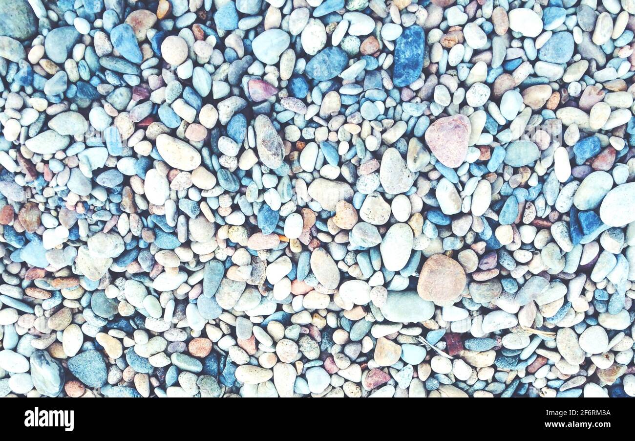 colored stones background and wallpaper Stock Photo - Alamy