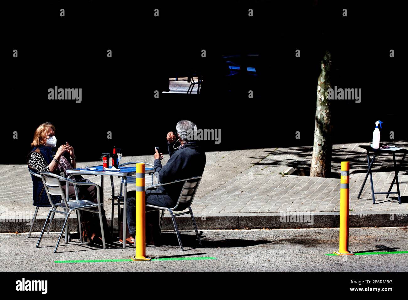 Couple sat at outdoor table of restaurant in one of Barcelona's new ...