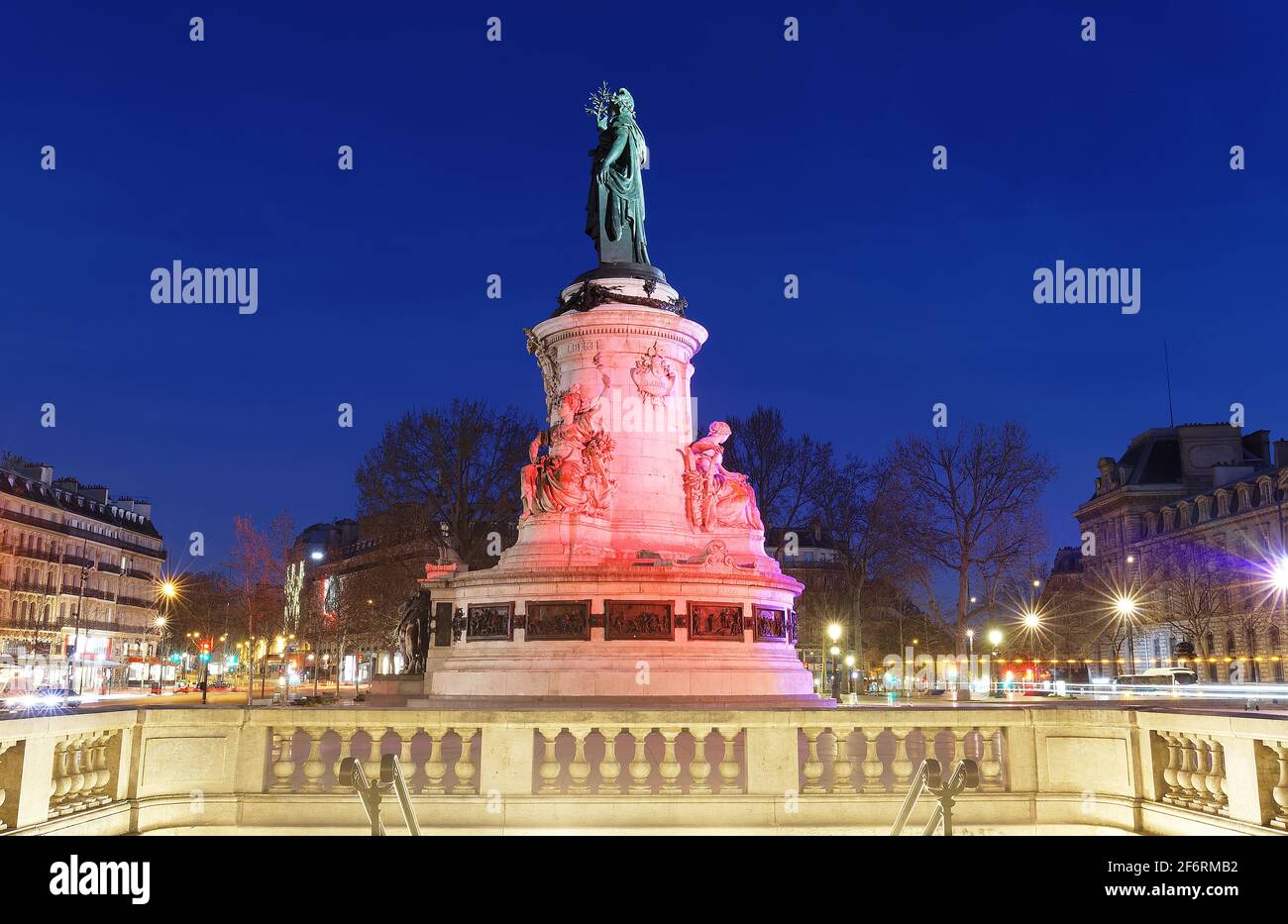 Monument to the republic at night . It is bronze statue of Marianne, a ...