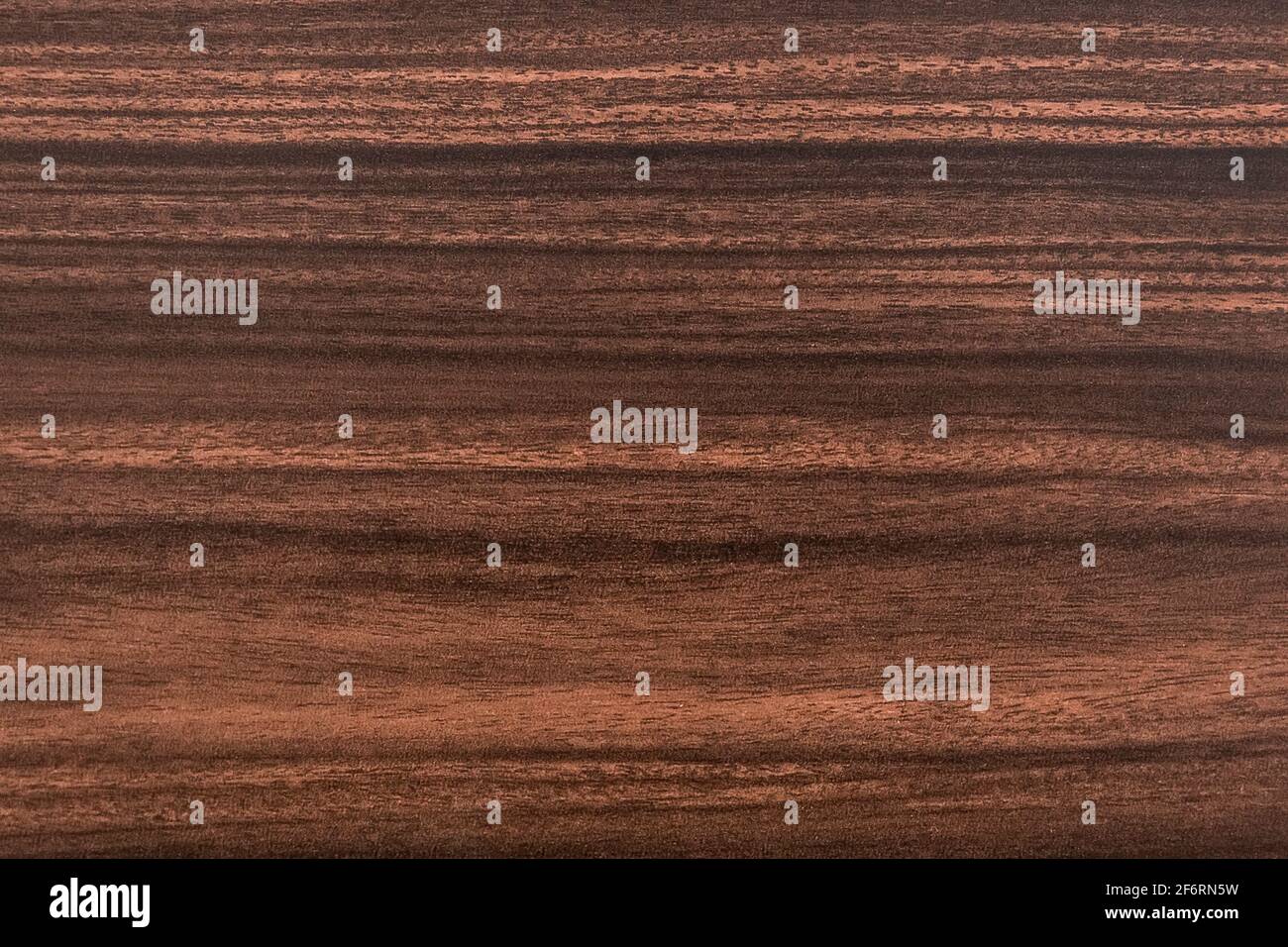 Dark brown wooden texture in chestnut color, table board or walnut ...