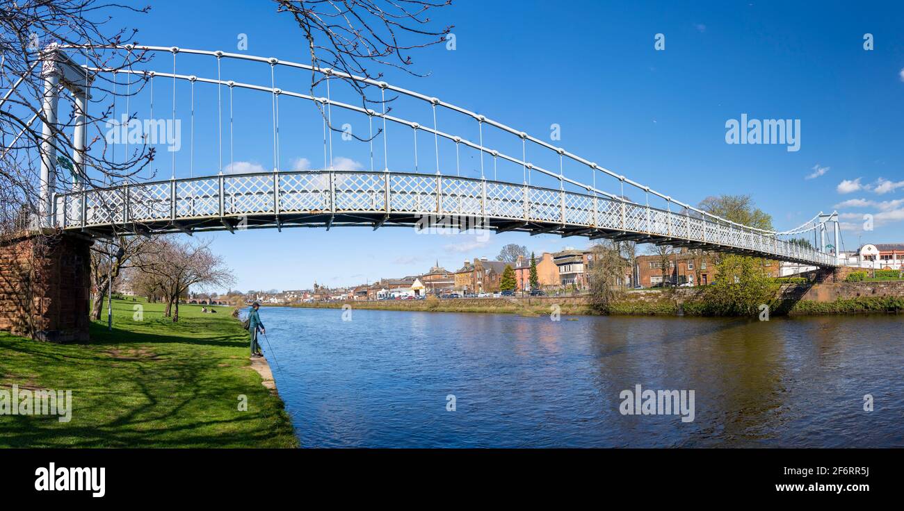 View of pedestrian footbridge over River Nith in Dumfries, Dumfries and ...