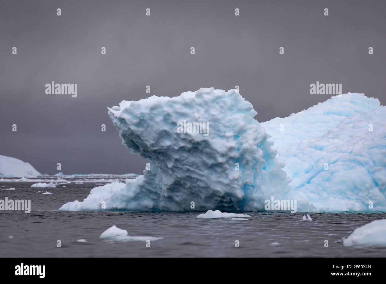 Beautiful iceberg up close with detail of blue shimmering ice on ...
