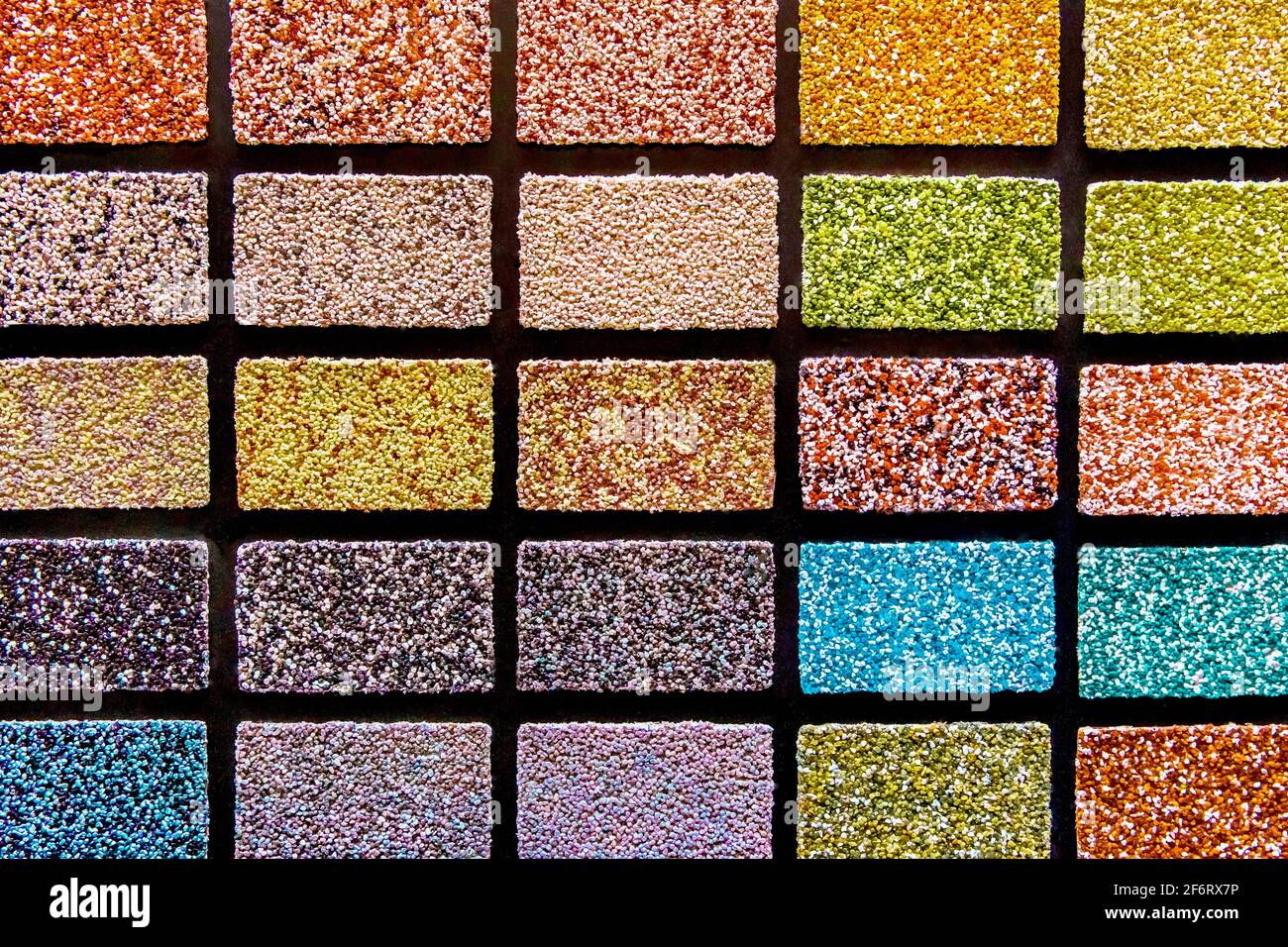 Samples of multi-colored drywall construction material for the ...