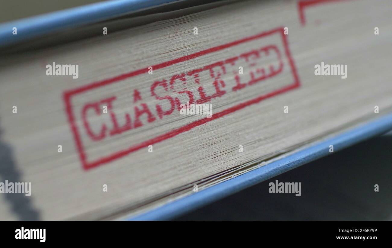 Classified stamp On Document Papers Stock Photo - Alamy
