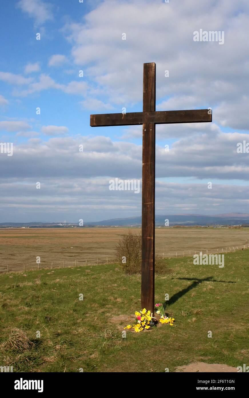 Flowers at foot of cross hi-res stock photography and images - Alamy