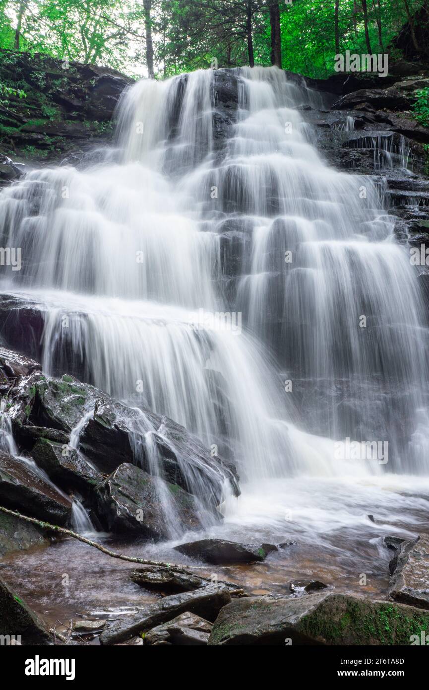 A large waterfall over some water Stock Photo - Alamy