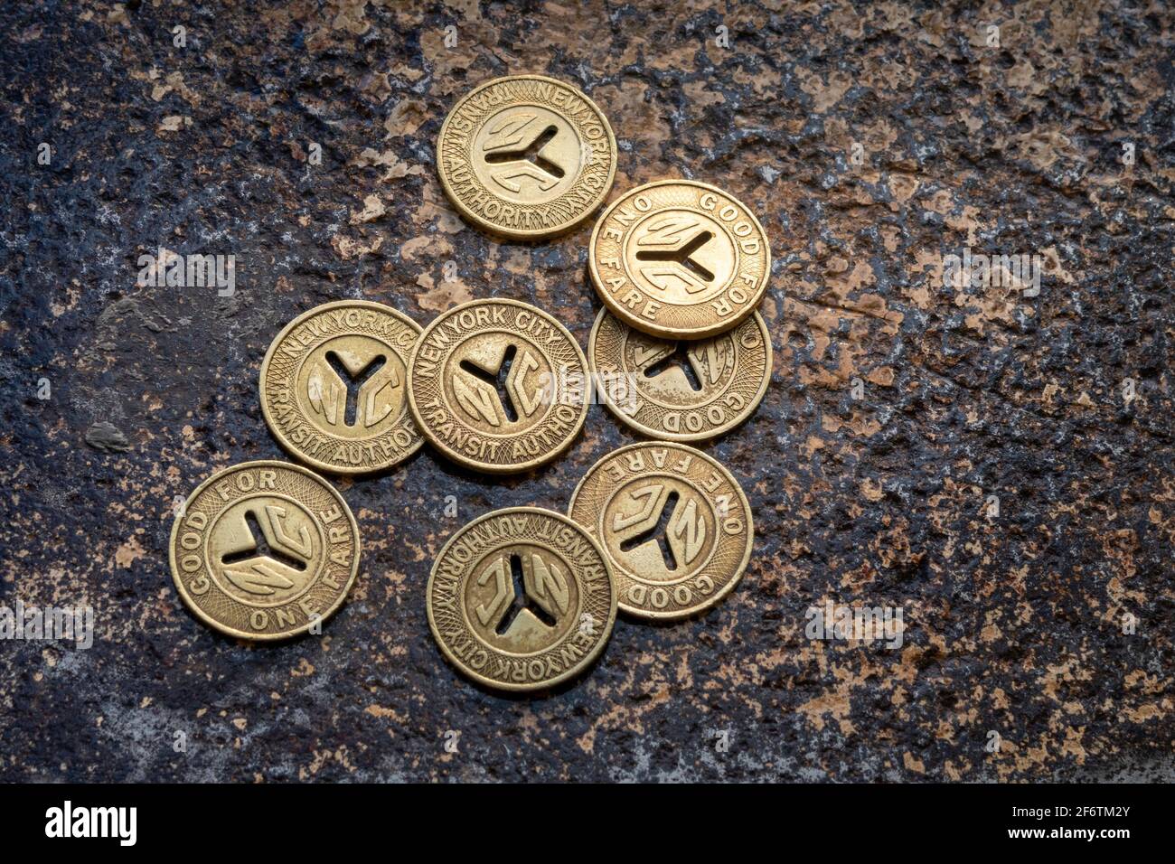 Still Life of the "small Y subway tokens" used in the 1950s and 1960s ...