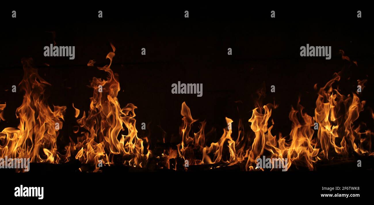 Fire line on black. Flame on dark background. A lot of space for text ...