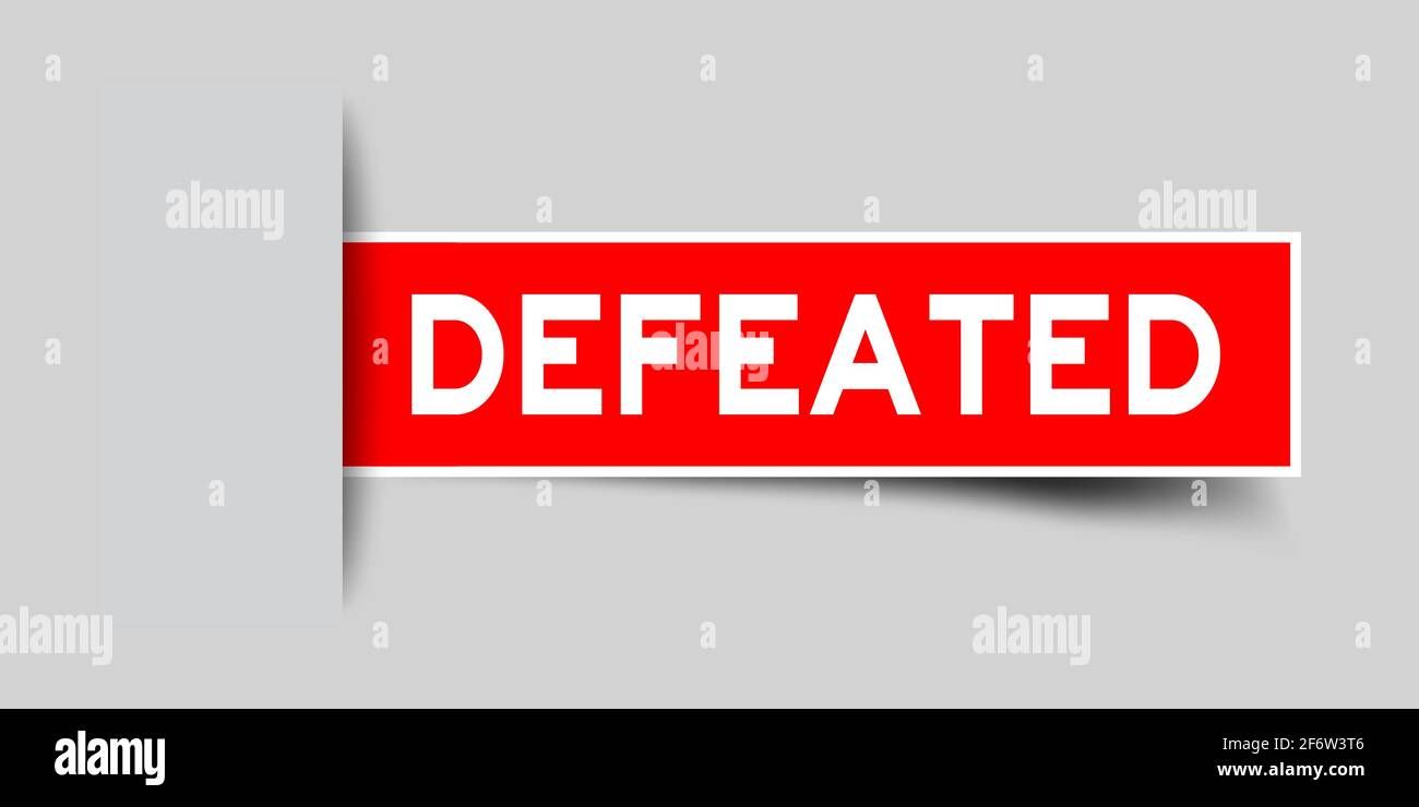 Label sticker red color in word defeated that inserted in gray ...