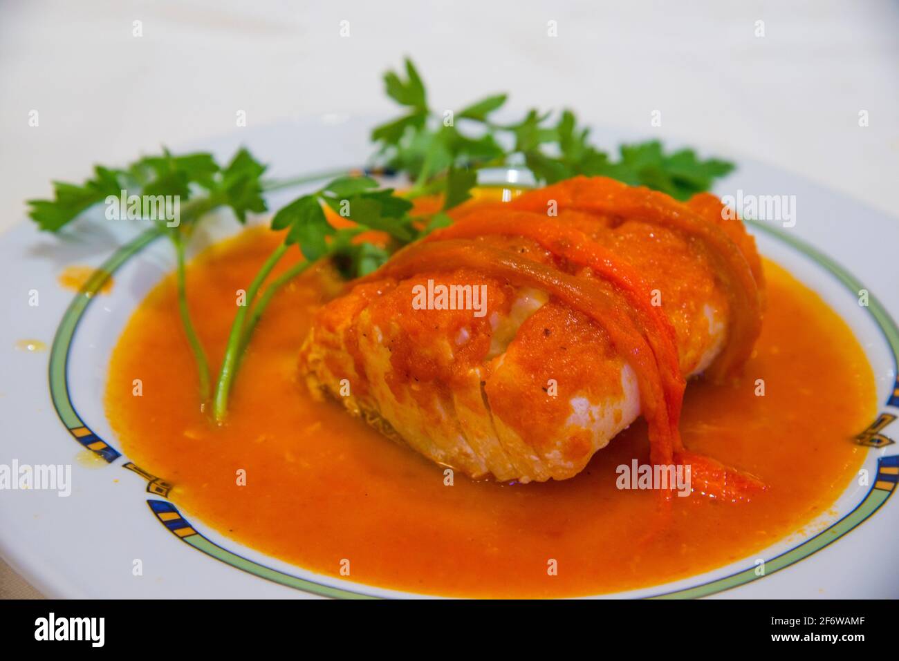 Cod fish, tomato sauce hi-res stock photography and images - Alamy