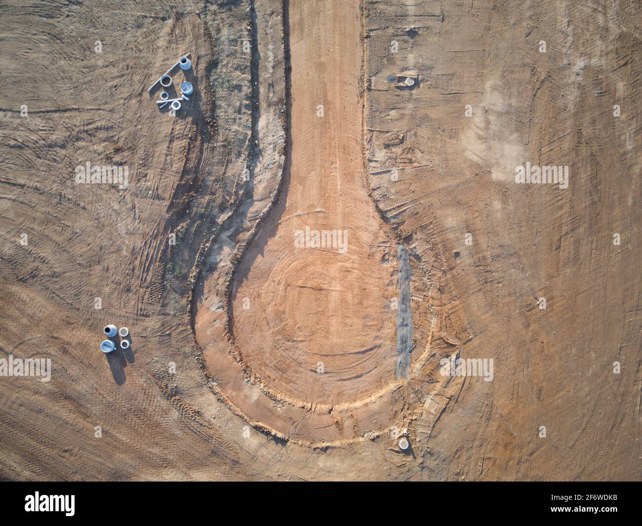 Aerial construction site showing footings and road landscaping for a ...