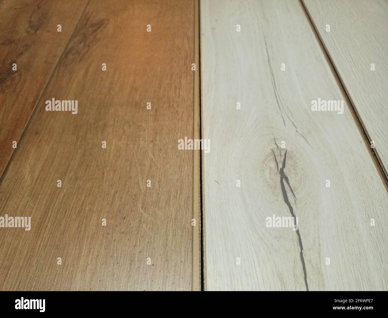 Laminated boards in a package. Floor coverings in packs. Wood texture ...