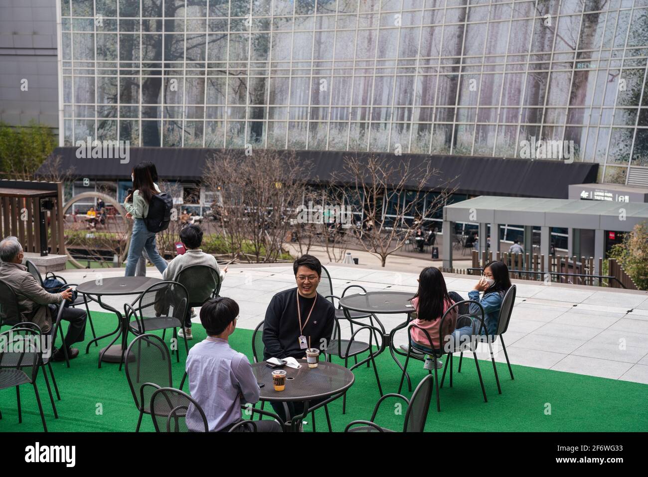 People sit and relax at I Park Mall in Seoul. (Photo by © Simon Shin ...