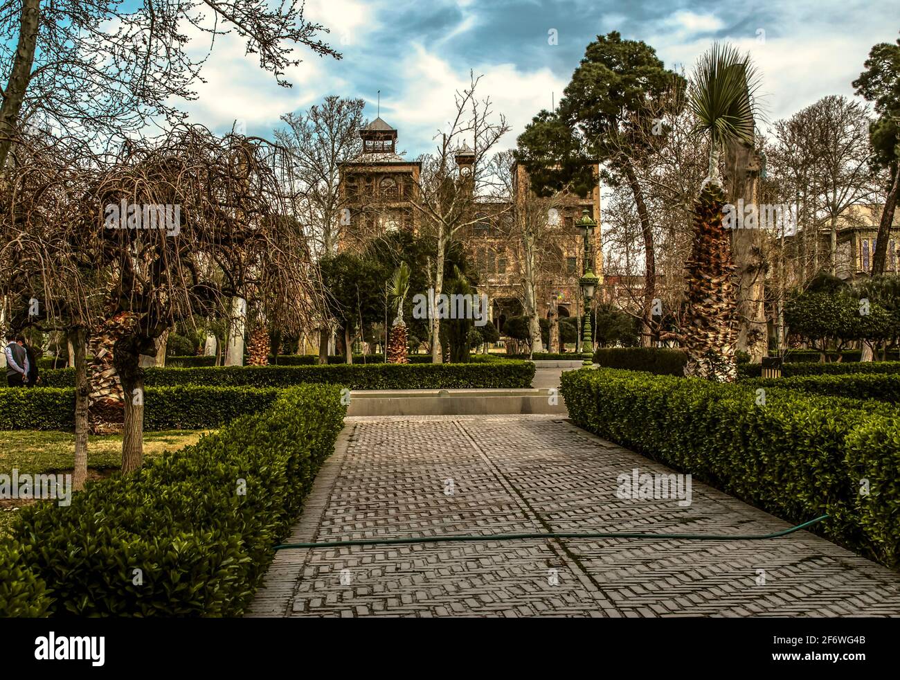Concrete road covered with decorative tiles through the ancient ...
