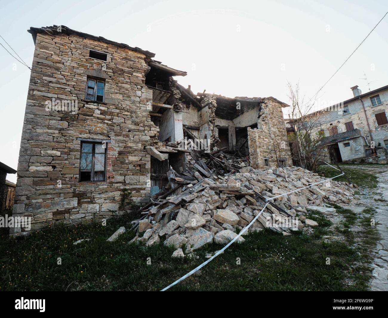 Collapsed old stone mountain house Stock Photo - Alamy