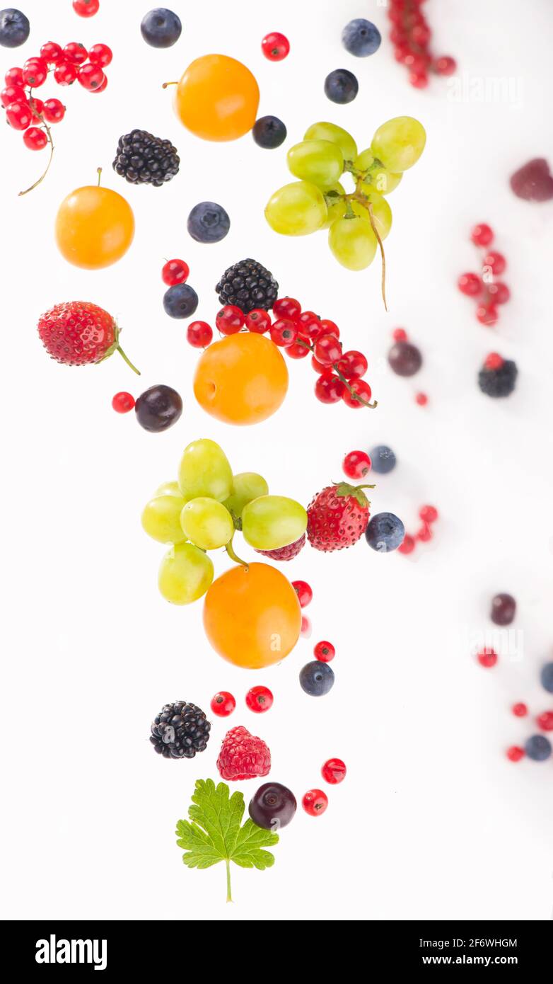 berry mix isolated on a white background Stock Photo - Alamy