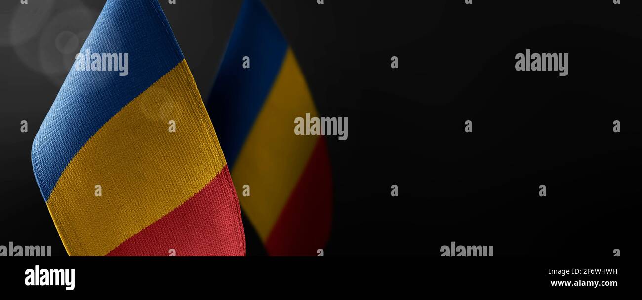 Small national flags of the Chad on a dark background Stock Photo - Alamy