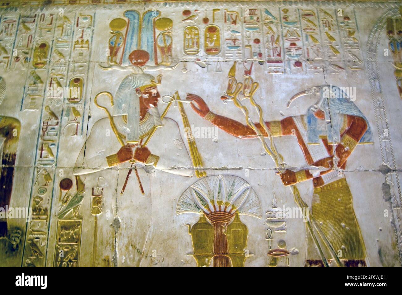 Ancient egyptian painted hieroglyphic carving showing the god of the ...