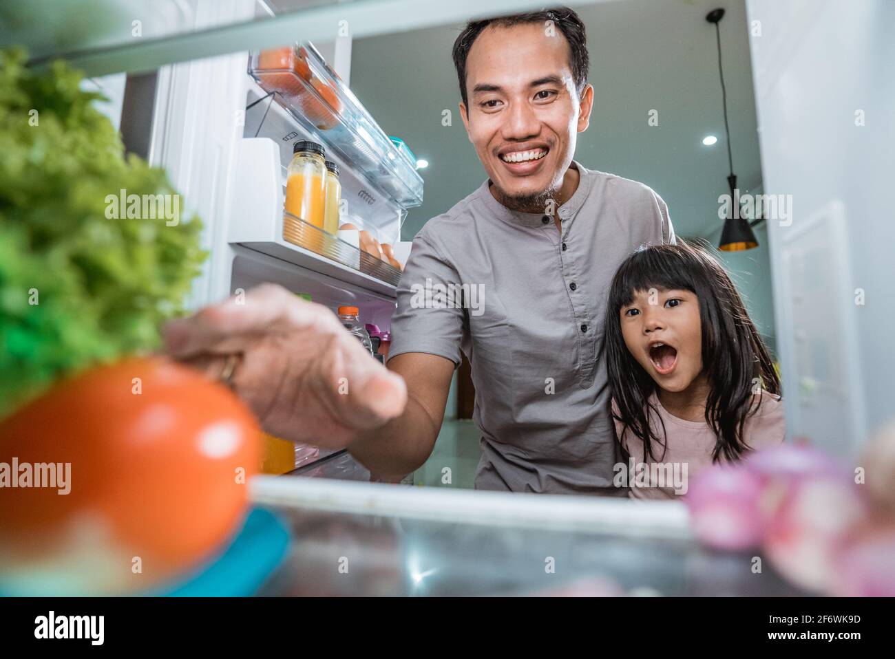 Food freezer man home hi-res stock photography and images - Alamy
