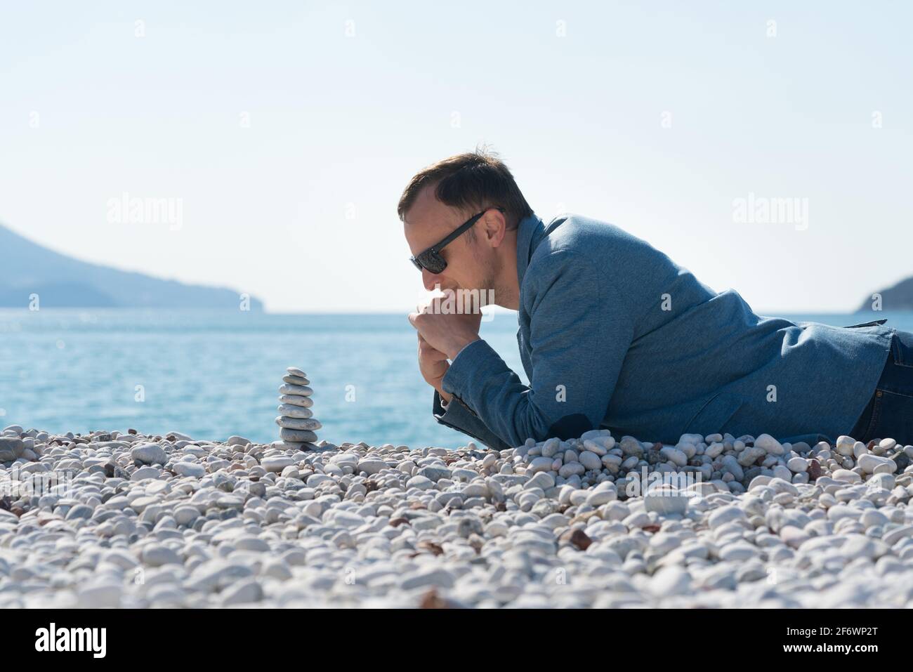 Man sitting on a pyramid hi-res stock photography and images - Alamy