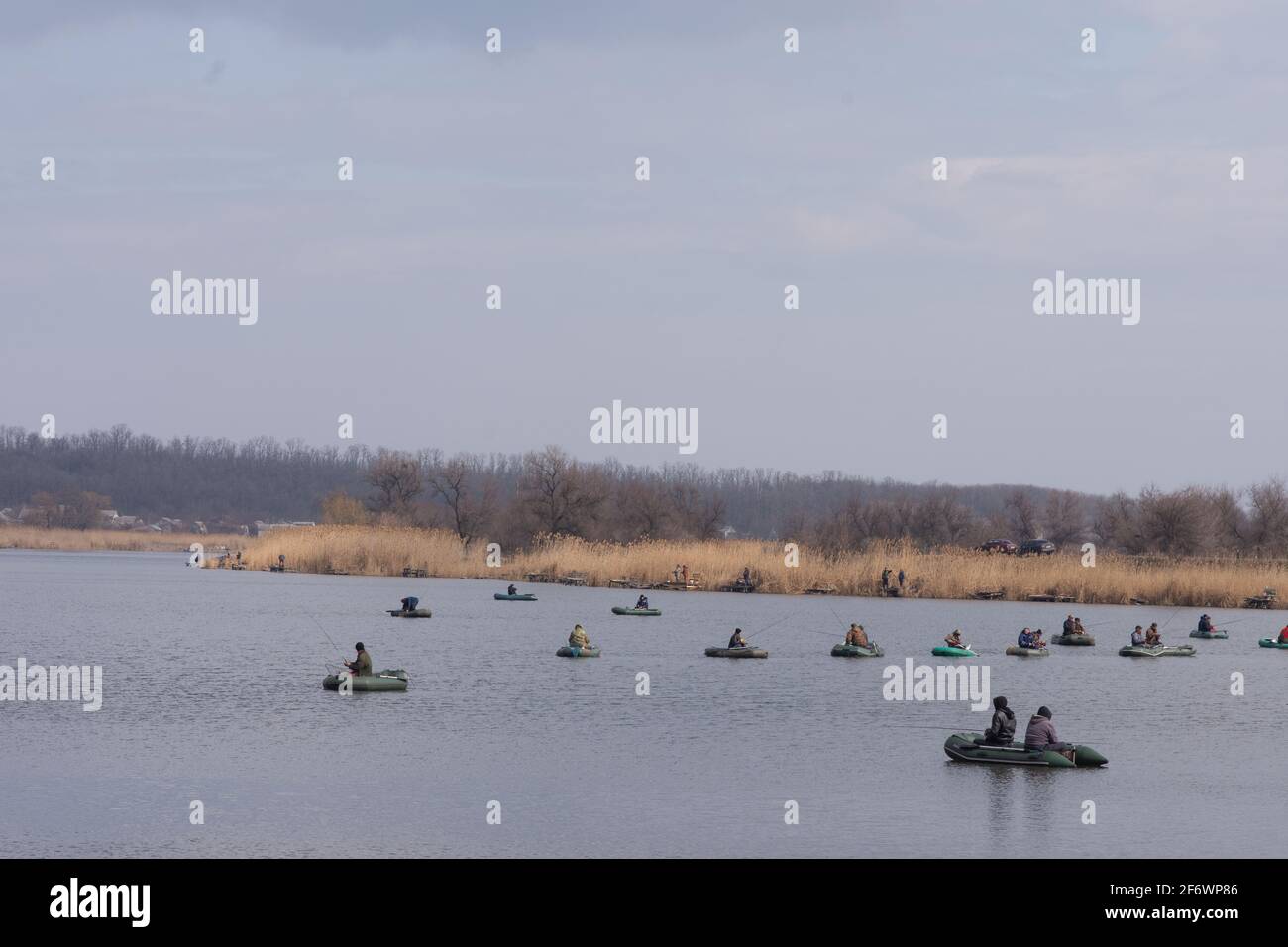Fishing on the Domotkan River, Ukraine. Many fishermen catch fish Stock ...