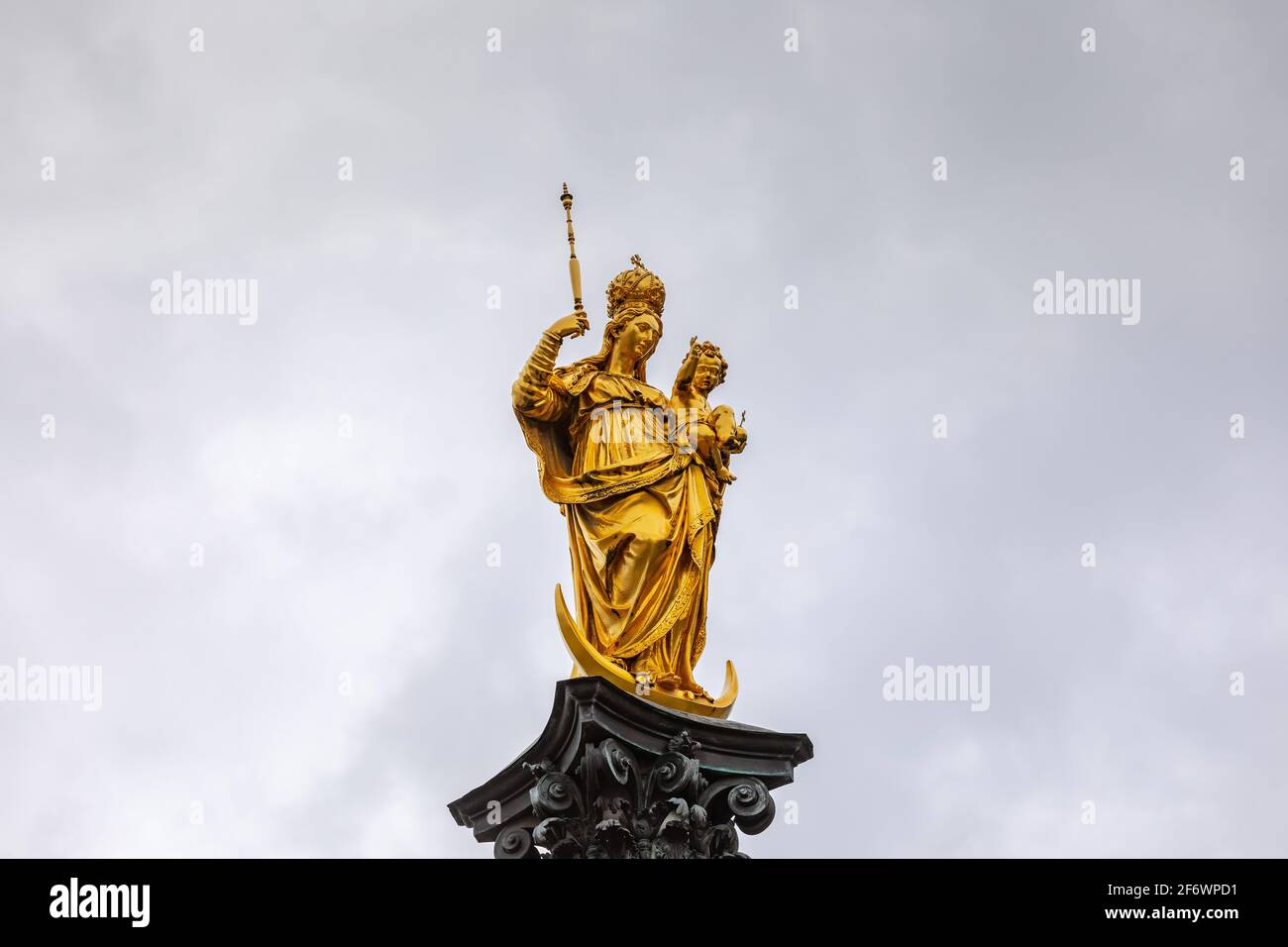 Golden statue of the Virgin Mary atop the Mariensäule, The Marian ...
