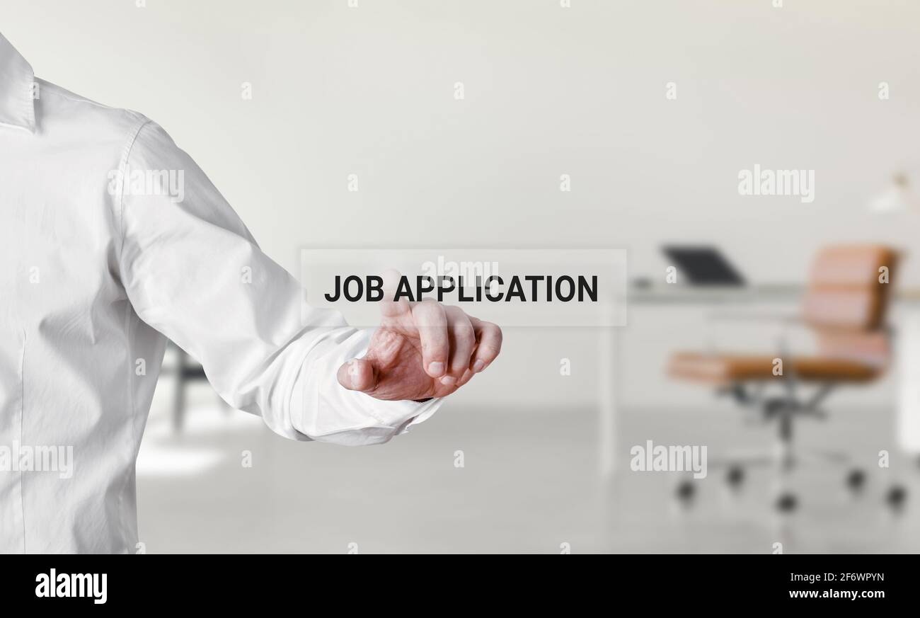 Businessman pressing the words job application on a virtual search ...