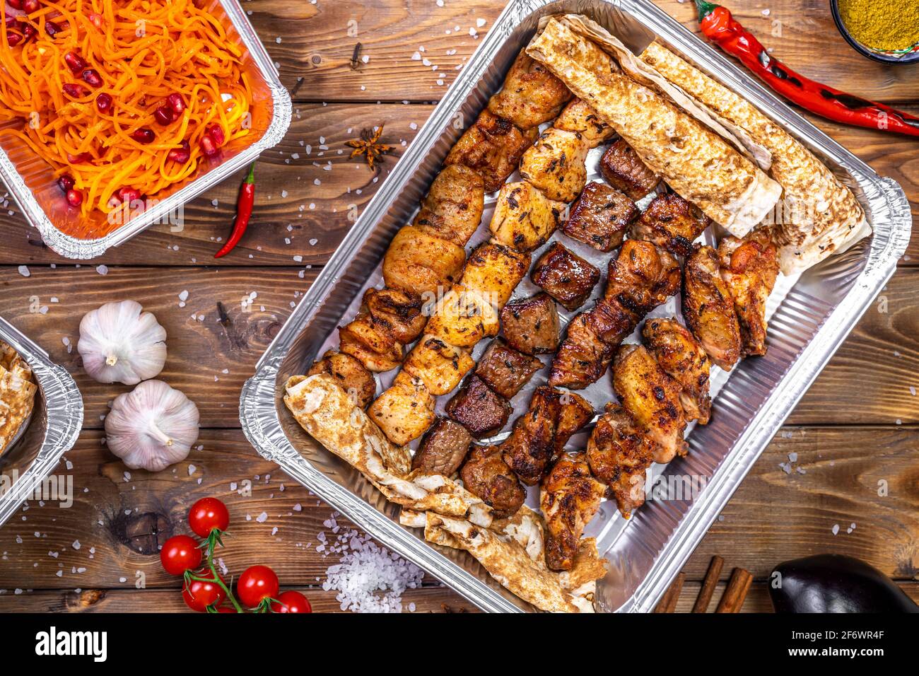 Shish Kebab and lula kebab are placed in a container. Food delivery ...