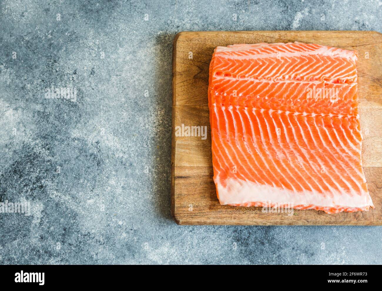 Salmon. Fresh raw salmon fish fillet with cooking ingredients, herbs ...