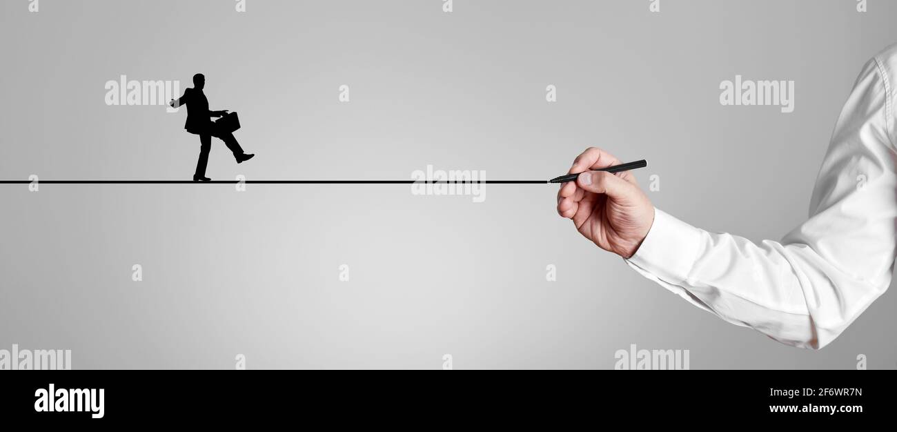 Businessman draws a bridge line with a silhouette man icon to walk ...