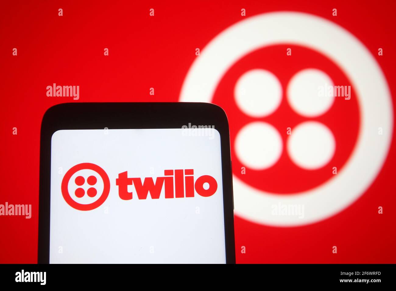 In this photo illustration a Twilio logo of an US cloud communications ...