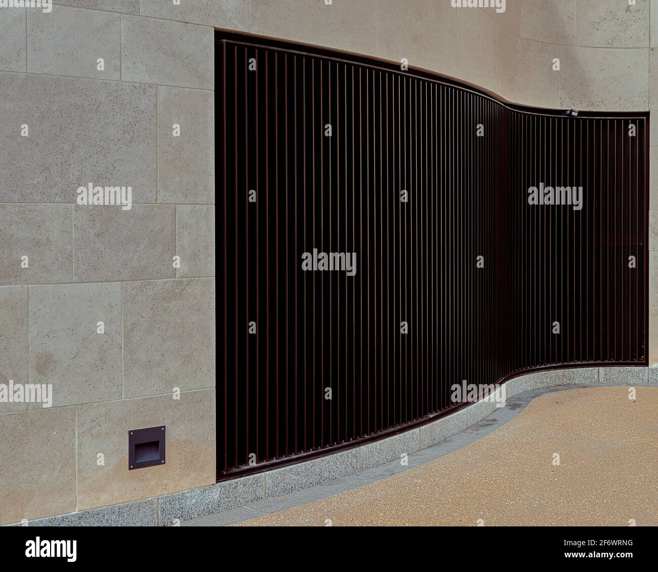 Side view of a modern buildings external air conditioning services vent ...