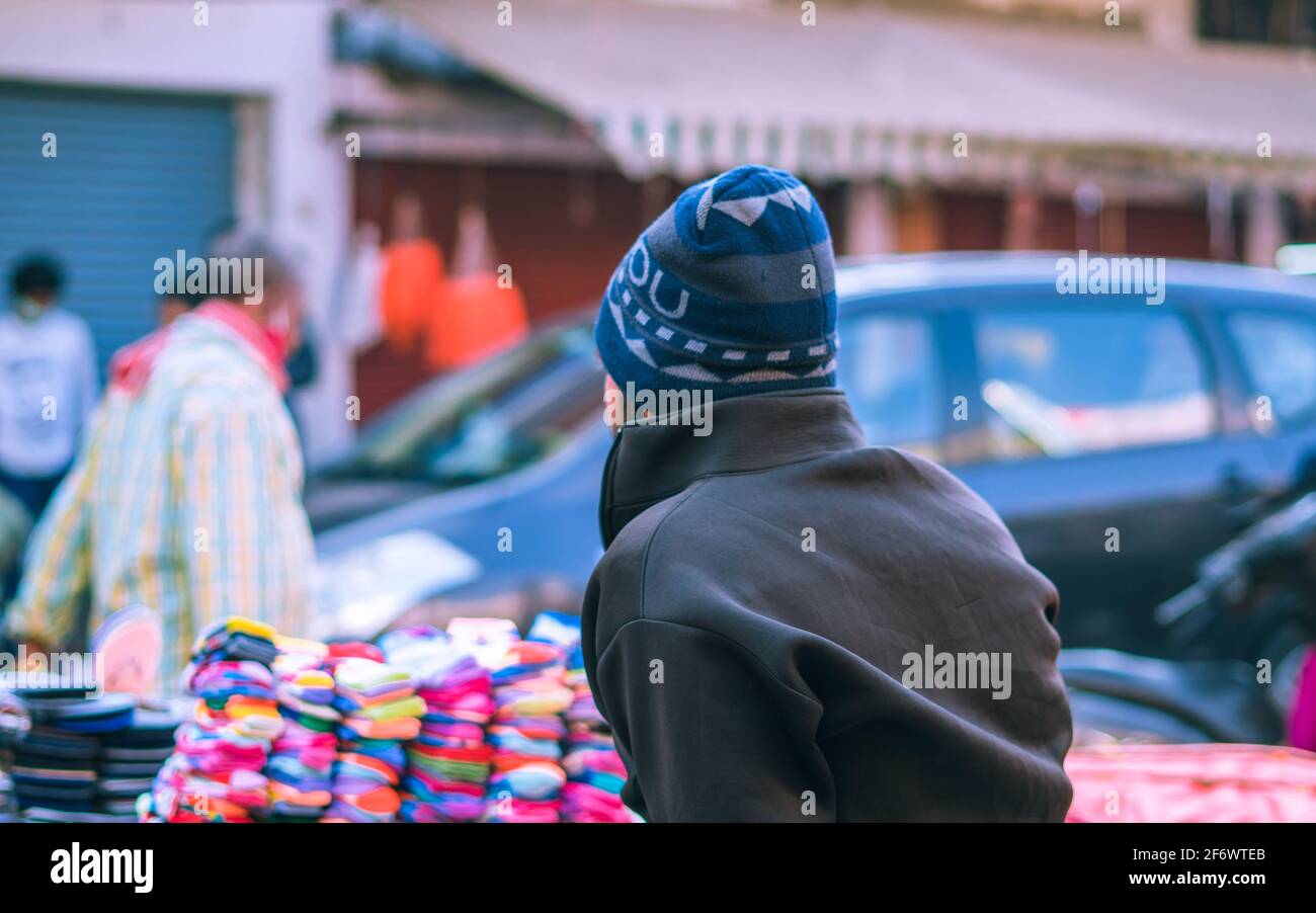 K.R.Market, Bangalore, India - February 06,2021: Street seller talking ...