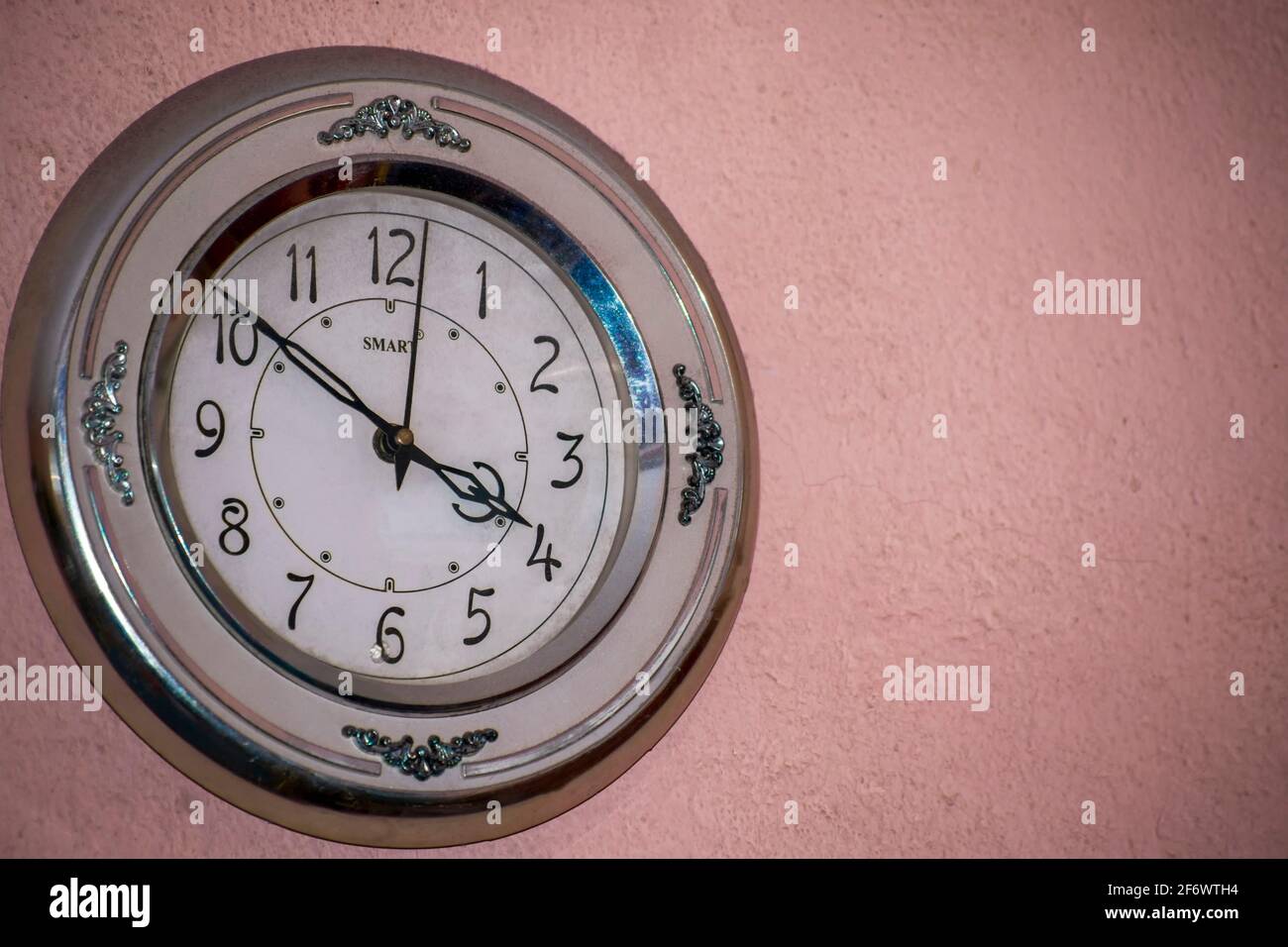 Clock hanging hi-res stock photography and images - Alamy