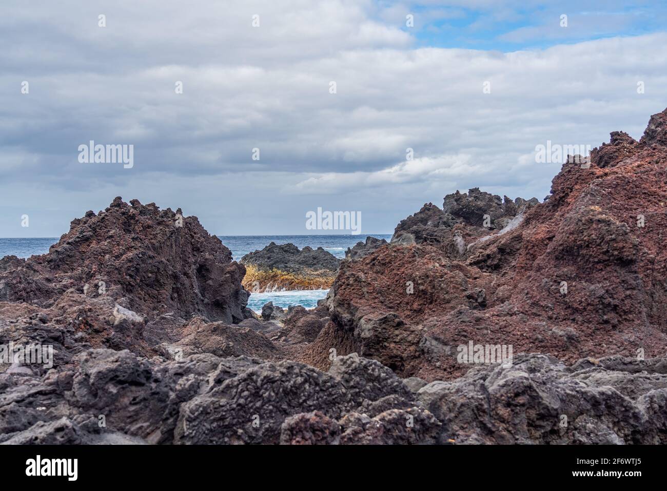 Natural volcanic rocks near Ponta da Ferraria, the place where hot ...