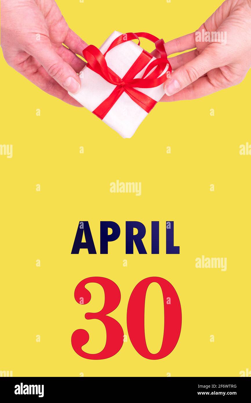 April 30th. Festive Vertical Calendar With Hands Holding White Gift Box ...