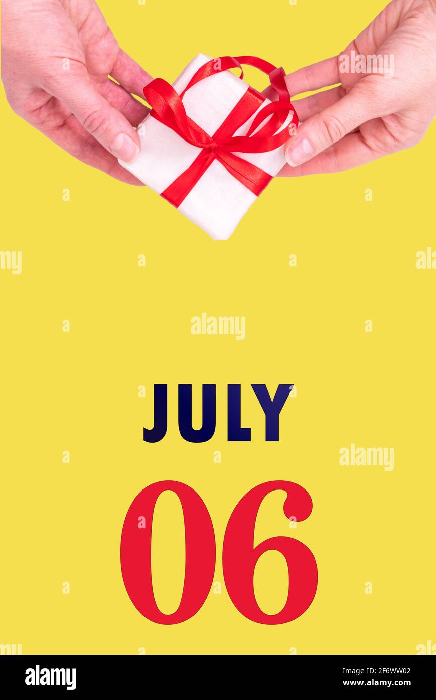 July 6th. Festive Vertical Calendar With Hands Holding White Gift Box ...