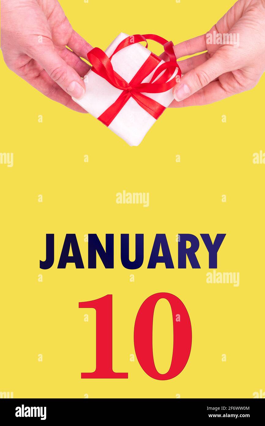 January 10th. Festive Vertical Calendar With Hands Holding White Gift ...
