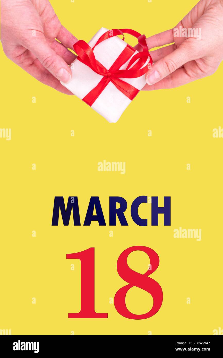 March 18th. Festive Vertical Calendar With Hands Holding White Gift Box ...