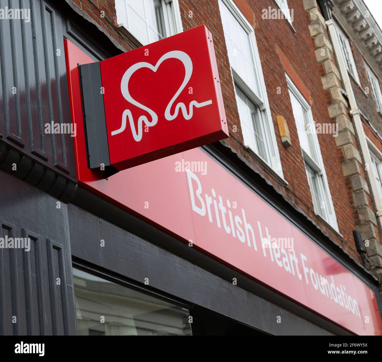 Wall mounted sign outside British Heart Foundation charity shop ...